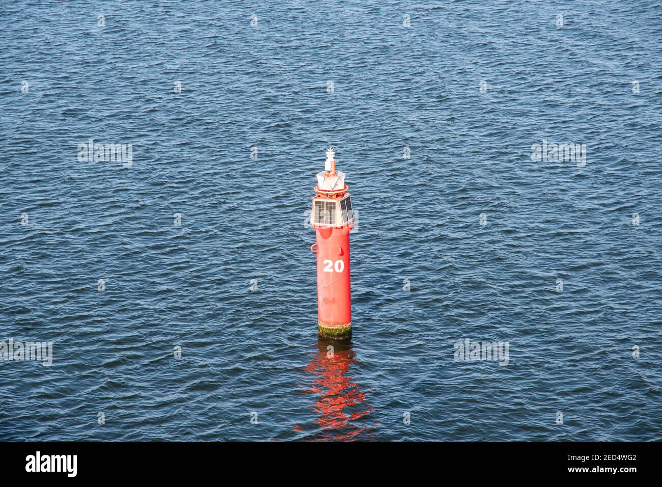 Red navigational buoy in the sea Stock Photo - Alamy