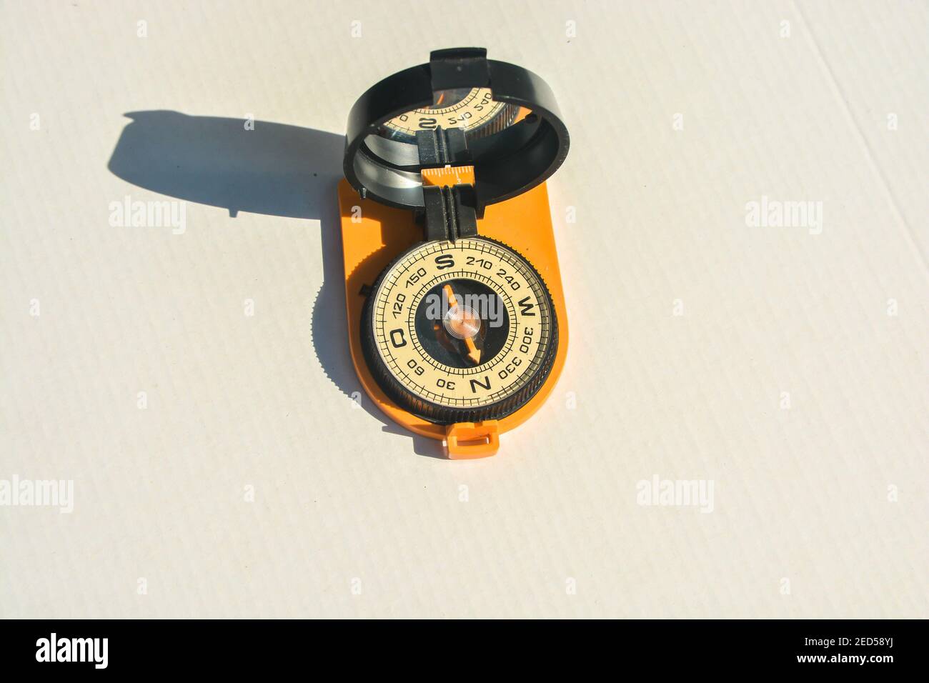 Compass. Magnetic compass on a white background Stock Photo - Alamy