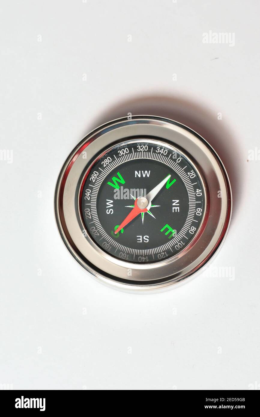 Compass. Magnetic compass on a white background Stock Photo - Alamy