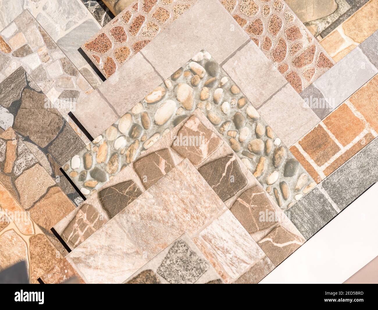 Many different models of floor tiles on display for sale Stock Photo ...