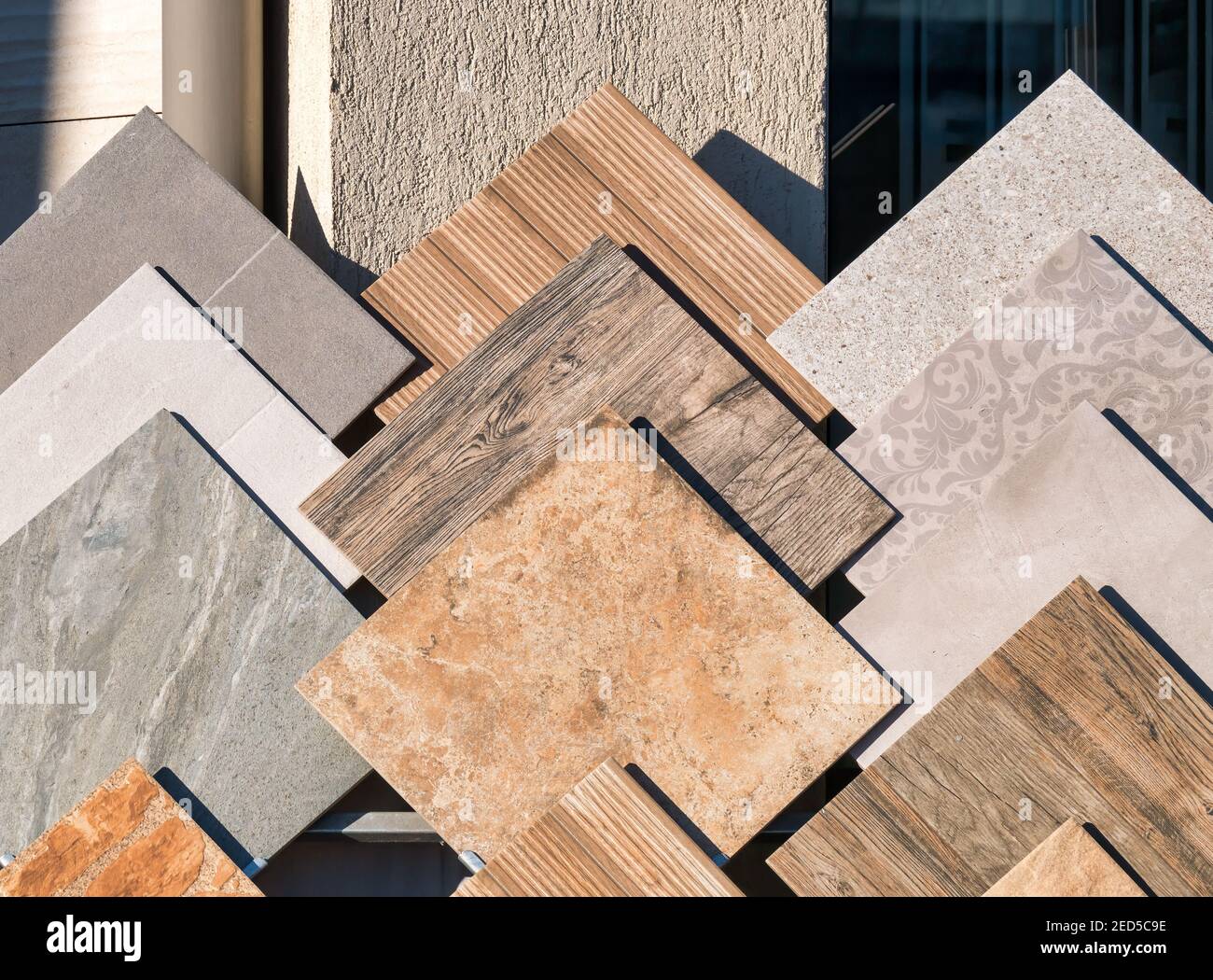 Many different models of floor tiles on display for sale Stock Photo ...