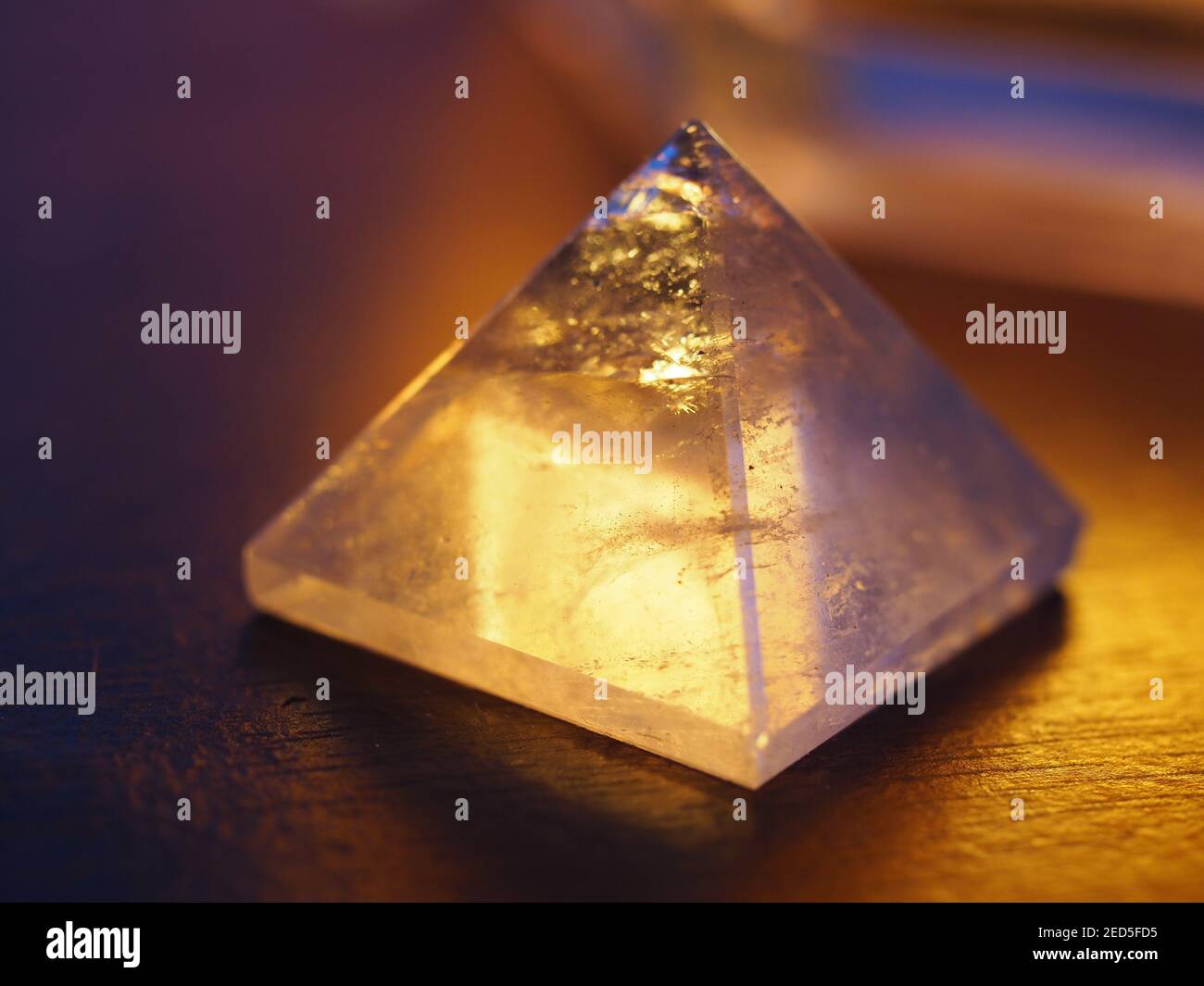 Clear Quartz Crystal Pyramid Backlit with Soft Warm Light Stock Photo ...