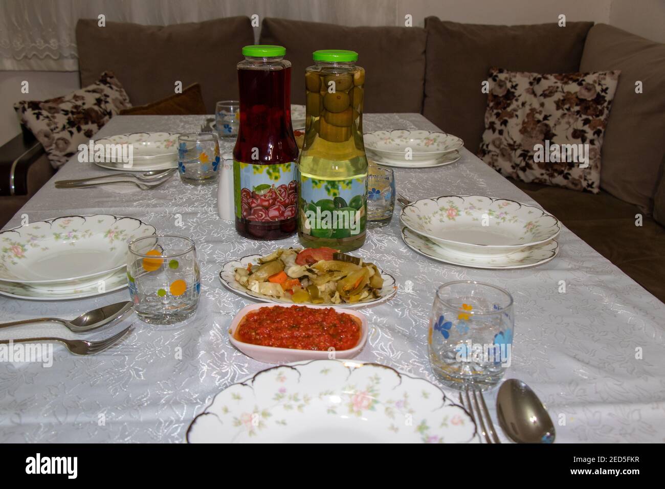 Family dinner table prepared for eating. The party begins in just a ...