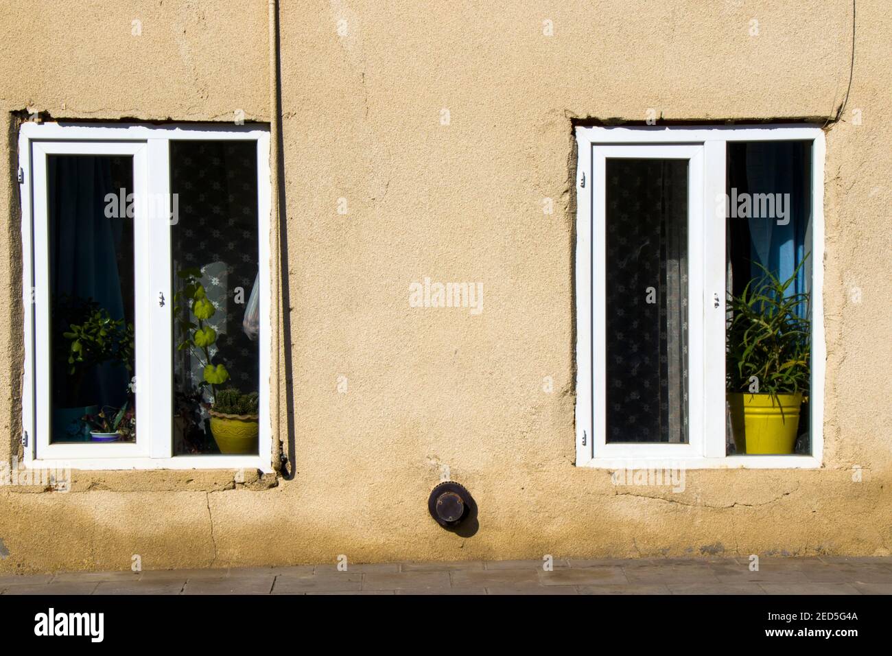 Old windows, house facade and sunlight in Bolnisi, Georgia Stock Photo ...
