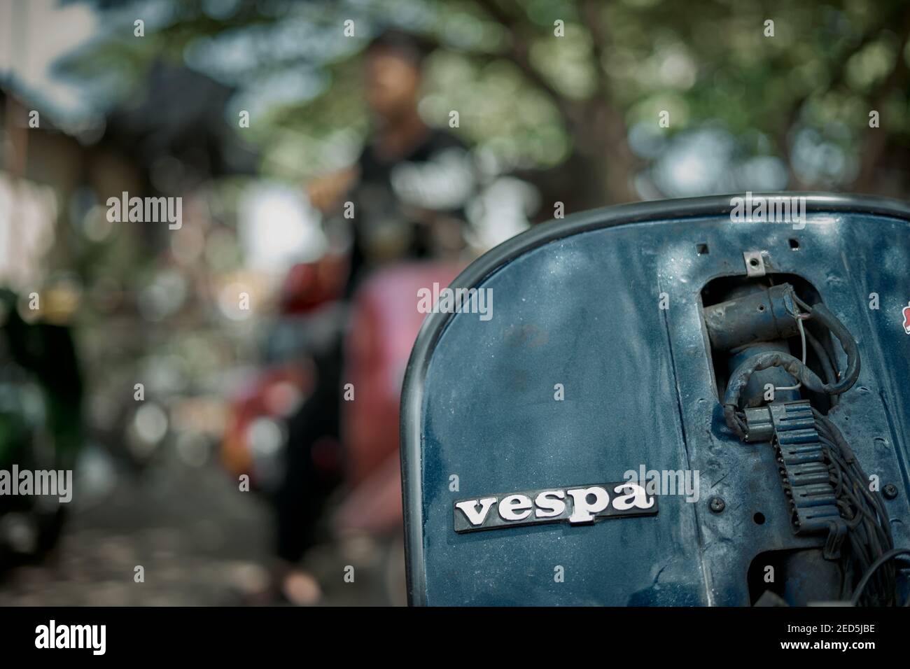 abandoned and broken Vintage Vespa in the workshop backyard Stock Photo ...