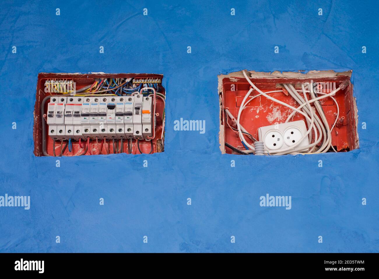 Final stage of electrical cable wiring works Stock Photo - Alamy