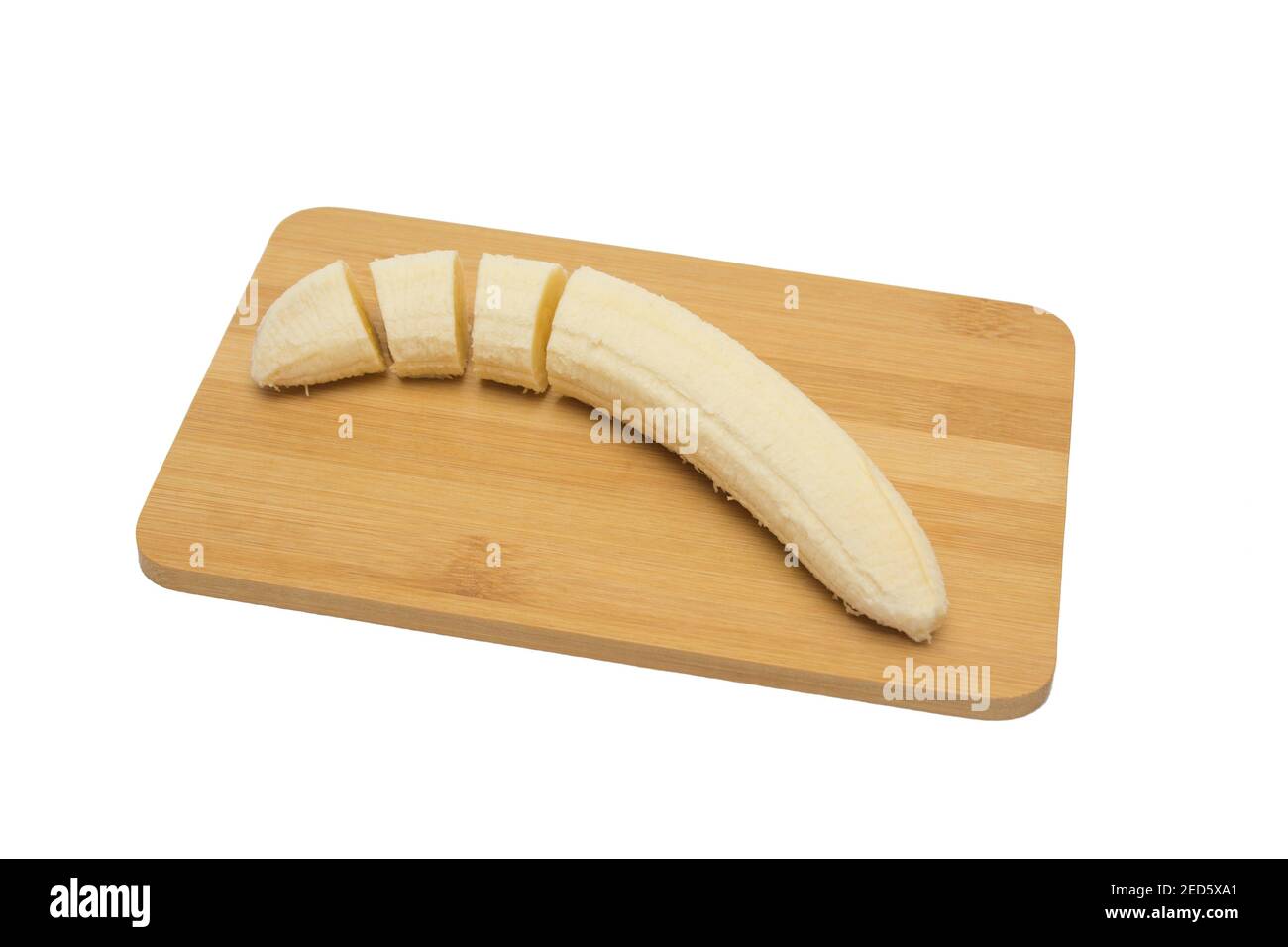 sliced banana on a cutting board, gradual serial cutting Stock Photo ...