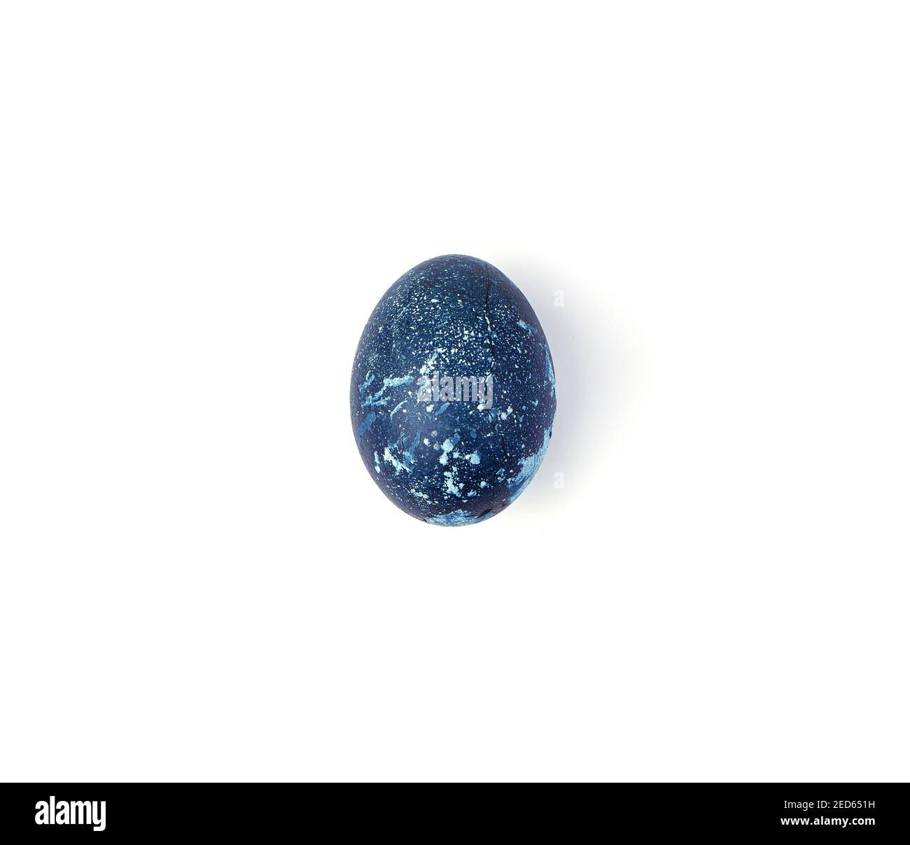 The egg is a marble-blue color on a white background Stock Photo - Alamy