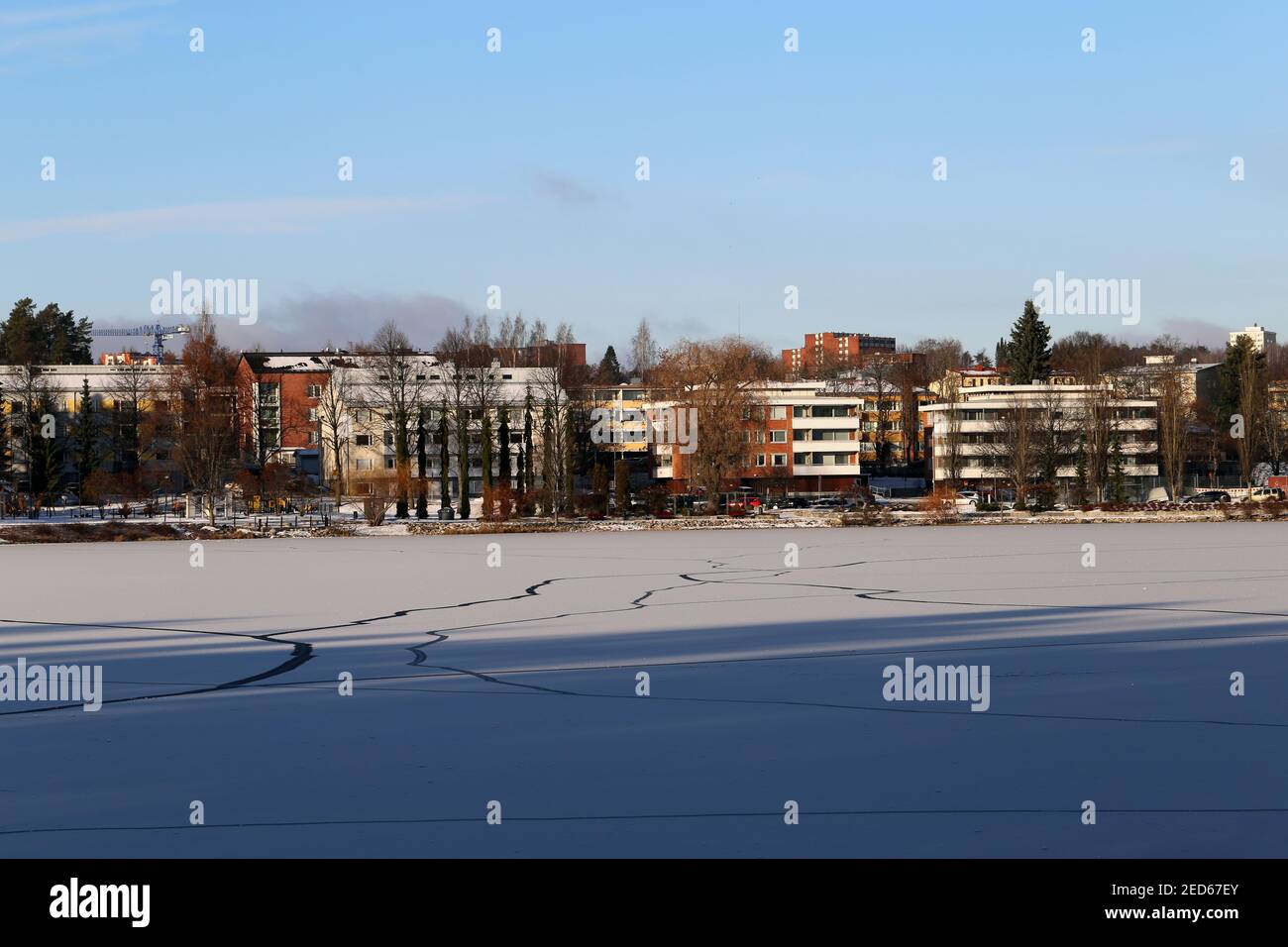 Beautiful wintertime view with frozen surface of lake Valkeinen and ...