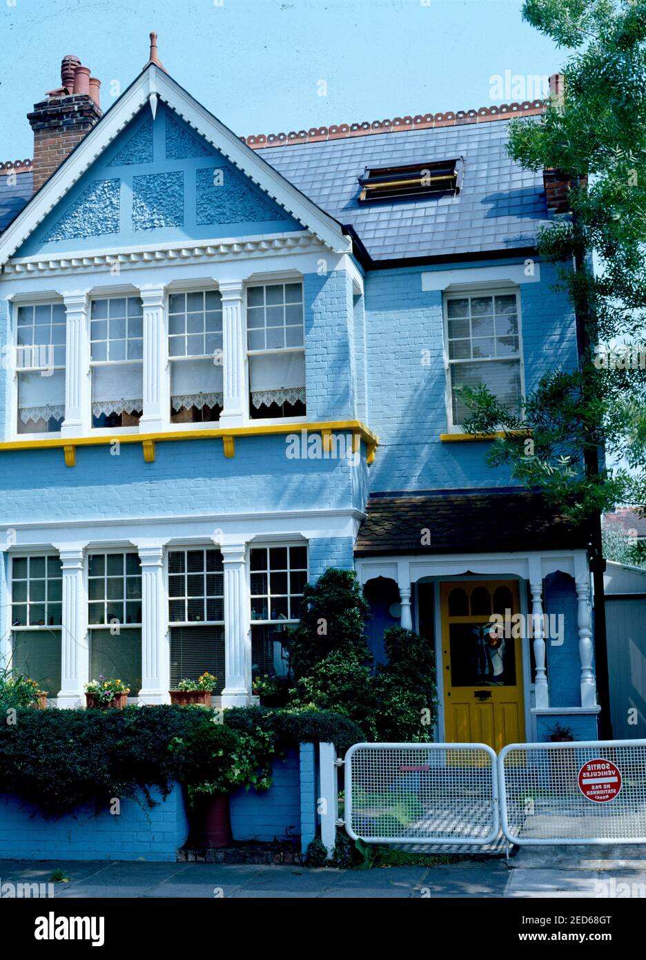 Blue painted exterior of Edwardian town house in London Stock Photo - Alamy