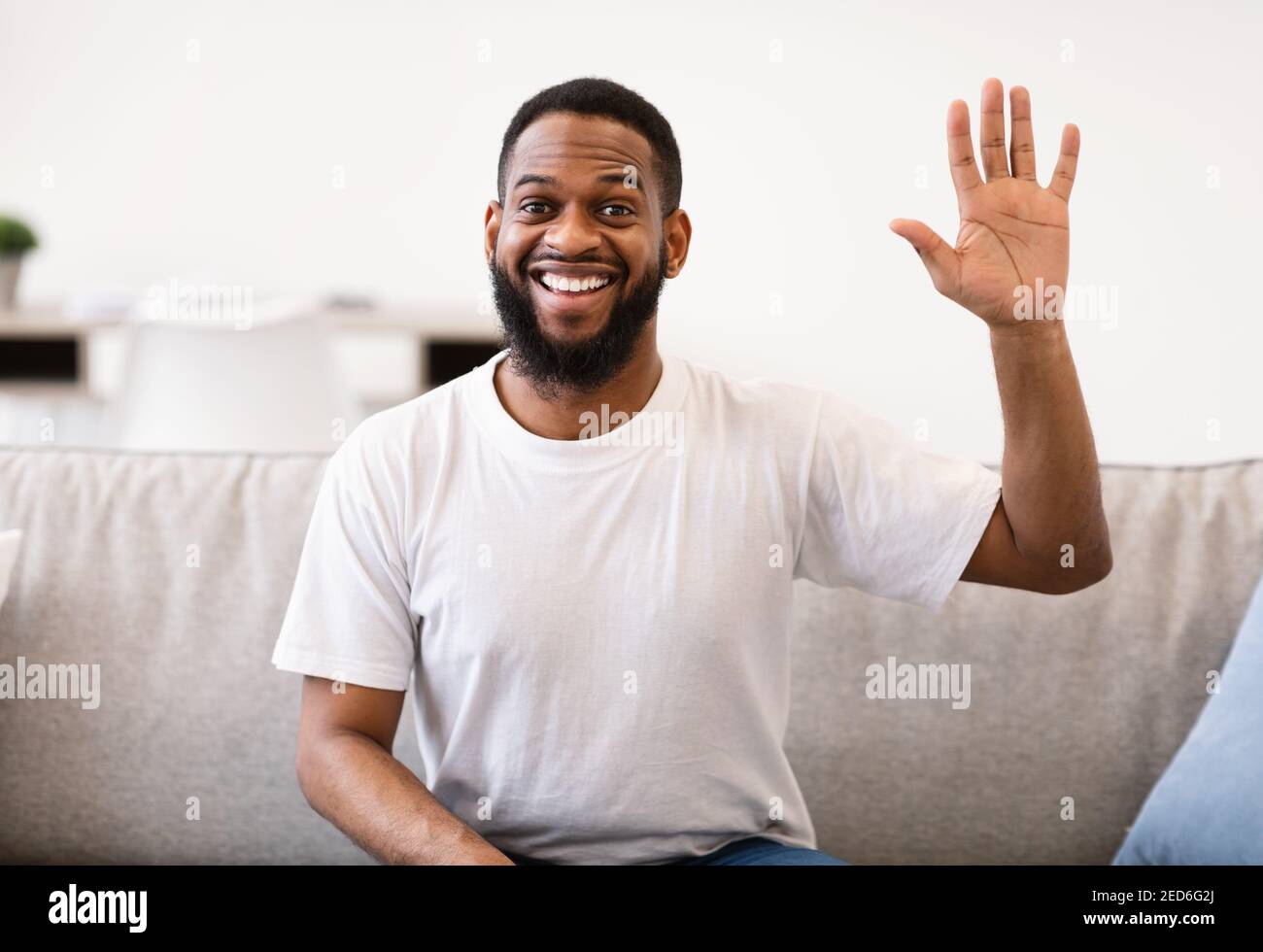 Man waving hand hi-res stock photography and images - Alamy