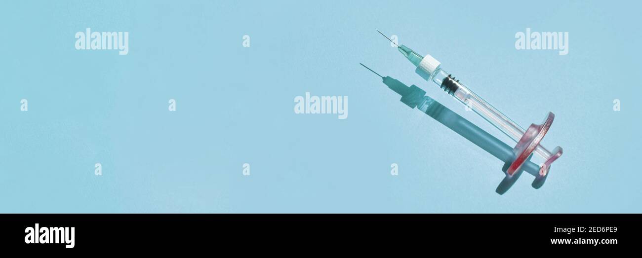 Syringe drug. Doctor injection vaccine. Hard shadow. Healthcare therapy ...