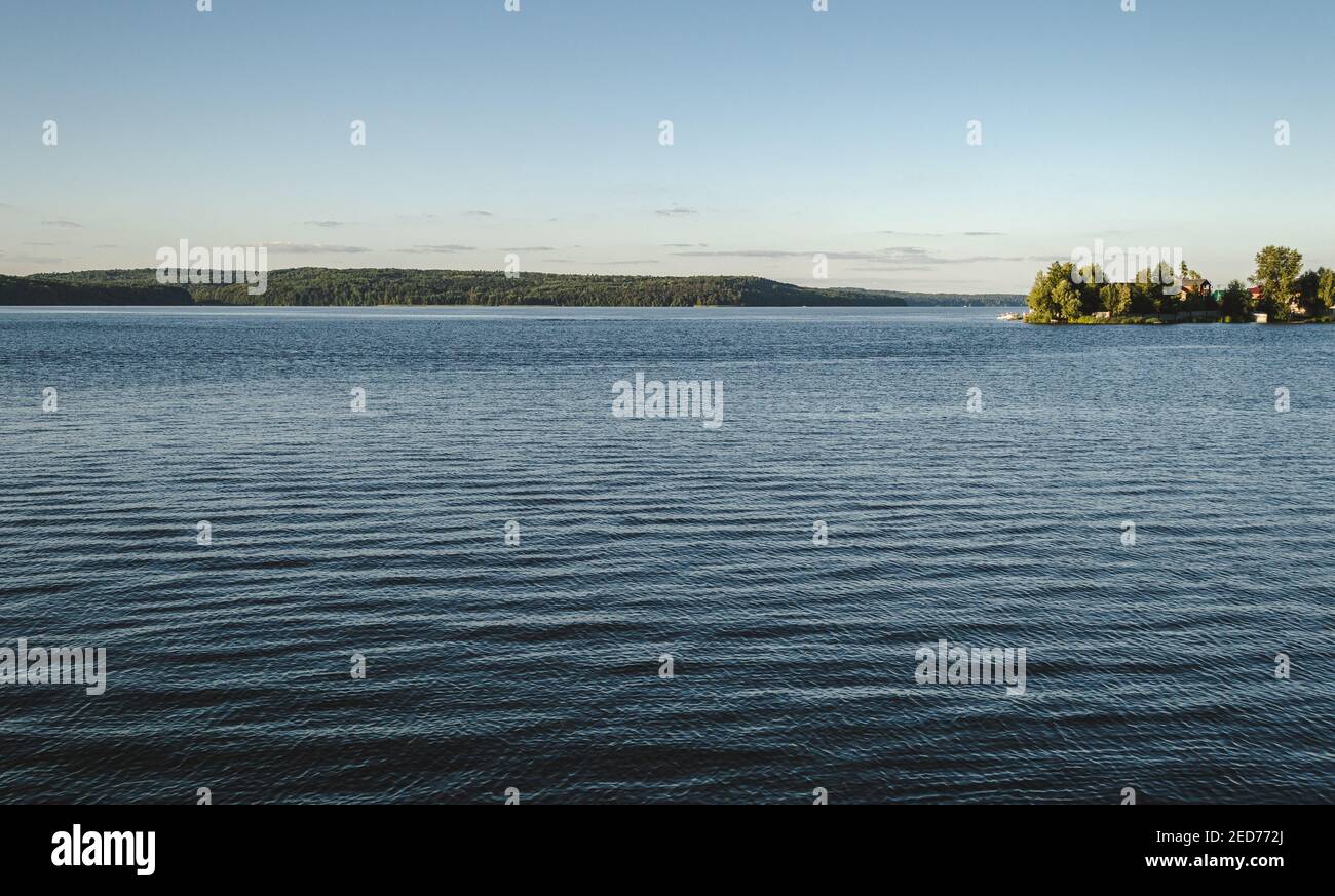 Lake landscape with ripples on water, relaxing view Stock Photo - Alamy