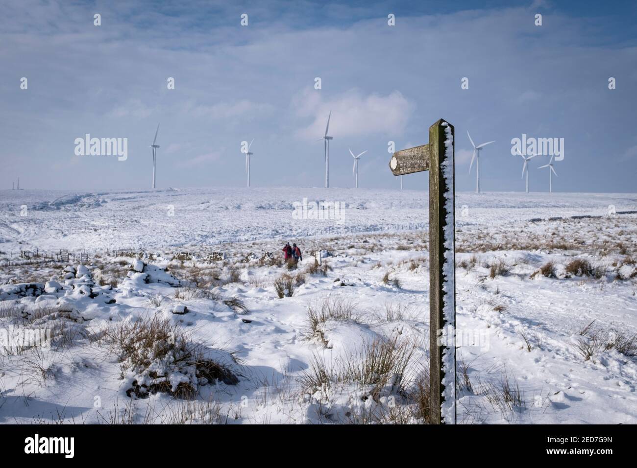 Walkers on Ovenden Moor Windfarm, Halifax, Yorkshire, UK Stock Photo ...