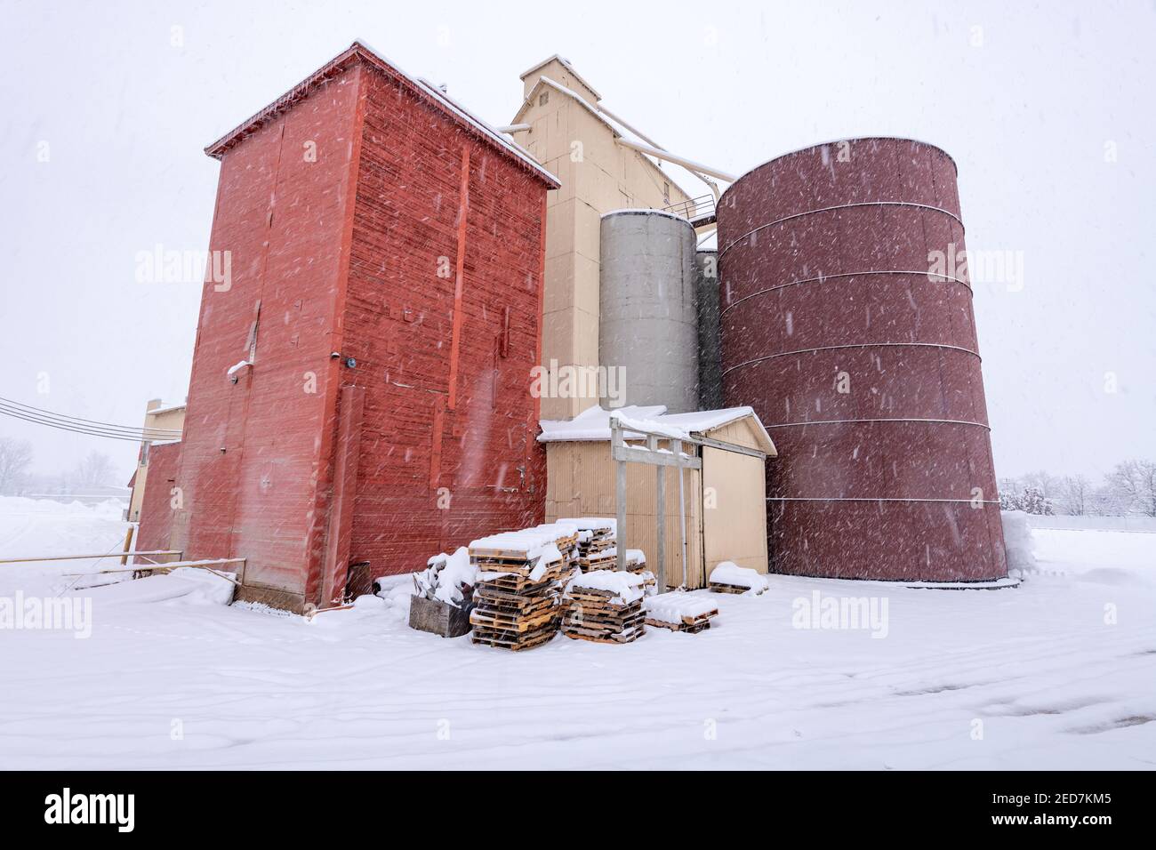 Fancy wool silos in winter while it is snowing Stock Photo - Alamy
