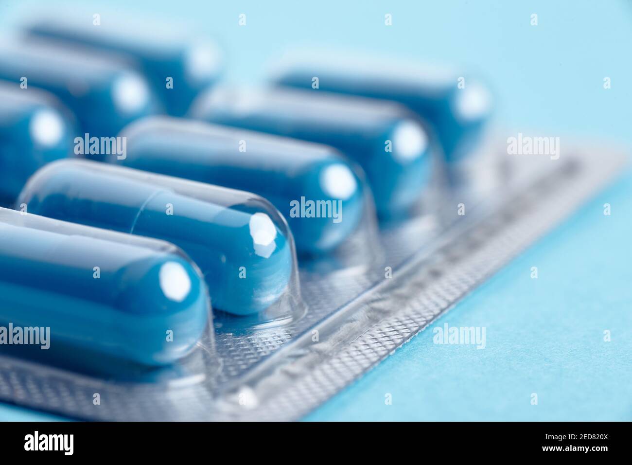 Blister pack of blue medicine pills. Close up photo Stock Photo - Alamy