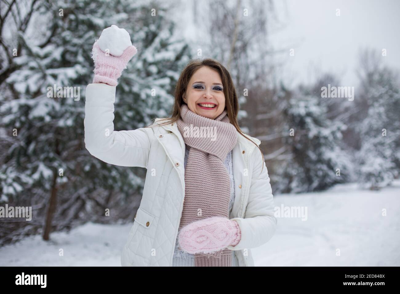 Lady making snowball hi-res stock photography and images - Alamy