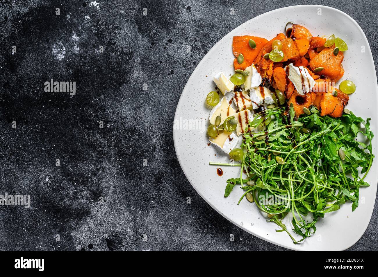 Grilled pumpking warm salad with arugula, walnuts and brie cheese ...