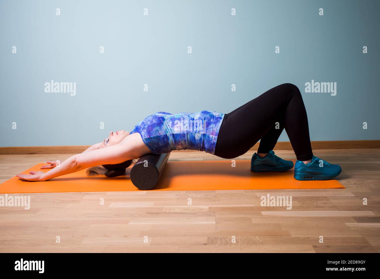 Performing muscle recovery techniques to use at home Stock Photo - Alamy