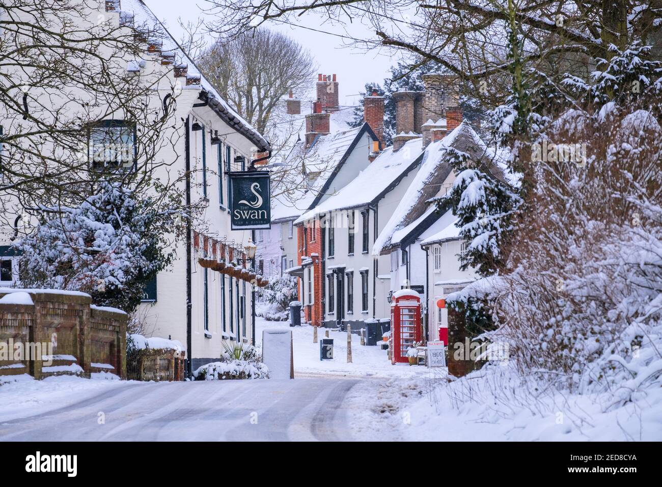 The village of Hoxne, Suffolk, East Anglia, UK. Winter snow scene after ...