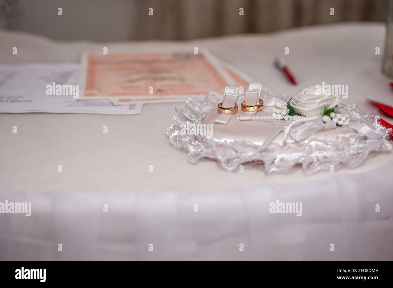 Wedding rings on a stand. wedding ceremony Stock Photo - Alamy