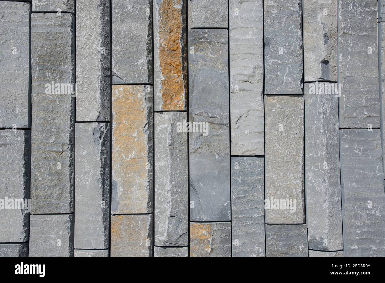 Stone wall surface pattern on a building Stock Photo - Alamy