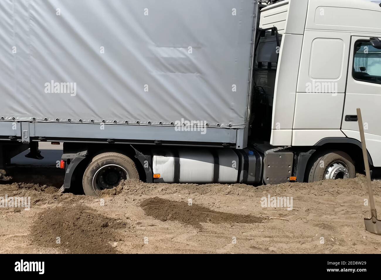 Car Stuck In Hole High Resolution Stock Photography and Images - Alamy