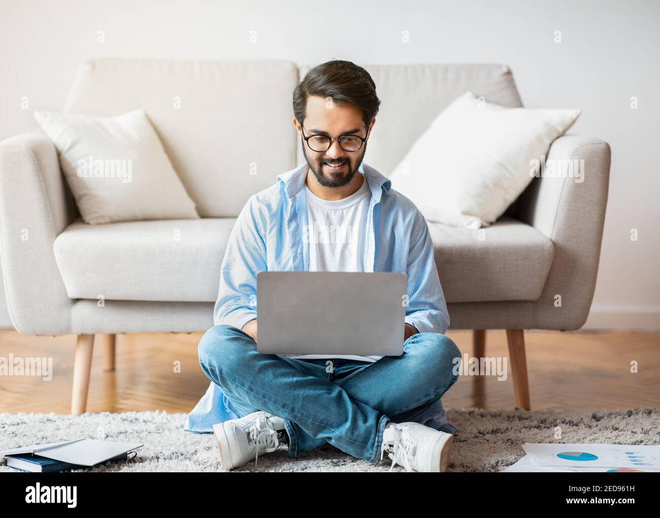 Remote Work Concept. Smiling Arab Freelancer Guy Using Laptop Computer ...