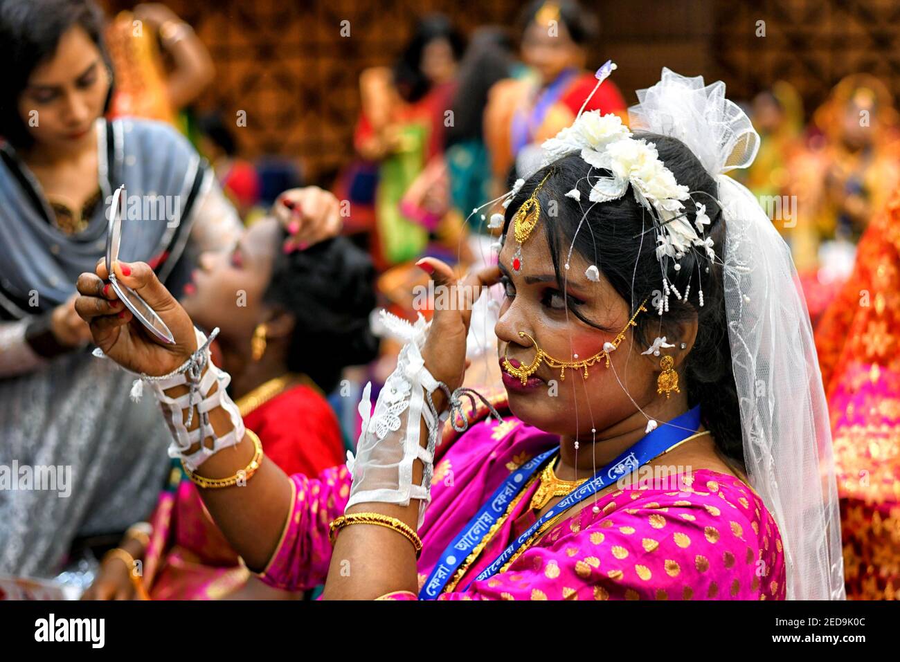A bride gets ready for the Marriage Ceremony. An NGO called "Aloy Phera ...