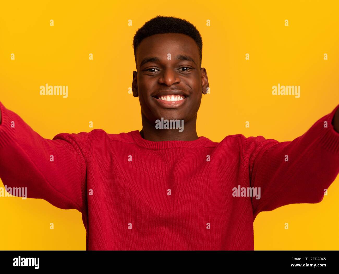 Selfie Time. Cheerful young african american guy making self-portrait ...