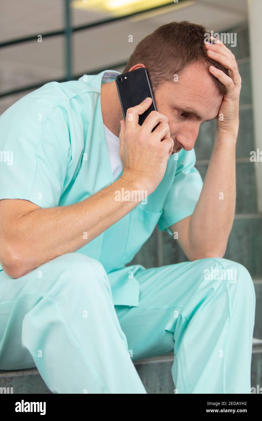young depressed doctor with personal issues Stock Photo - Alamy