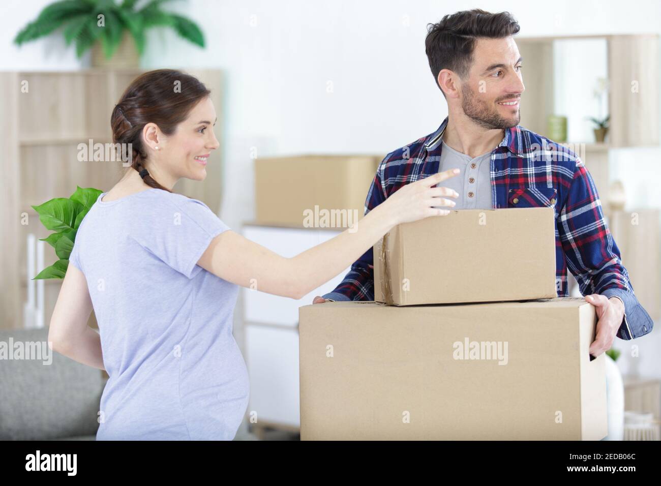 Bonding boxes family packing hi-res stock photography and images - Alamy