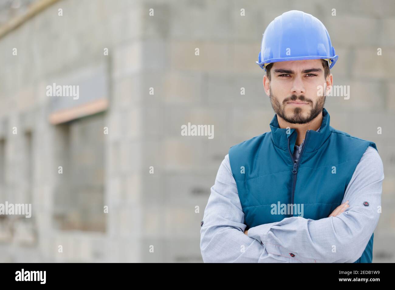 male builder construction worker on building site Stock Photo - Alamy
