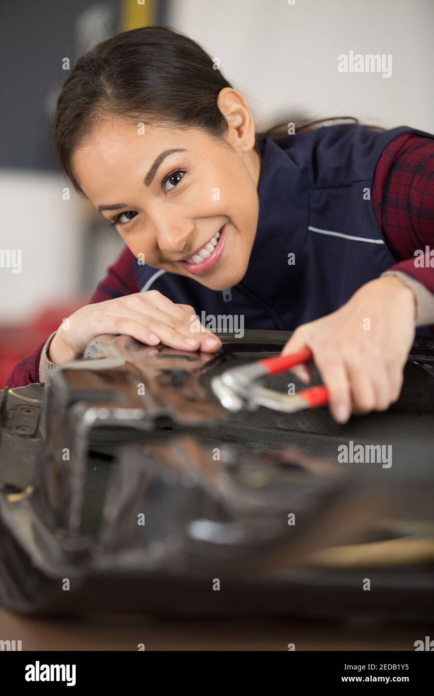 beautiful female worker with tools Stock Photo - Alamy