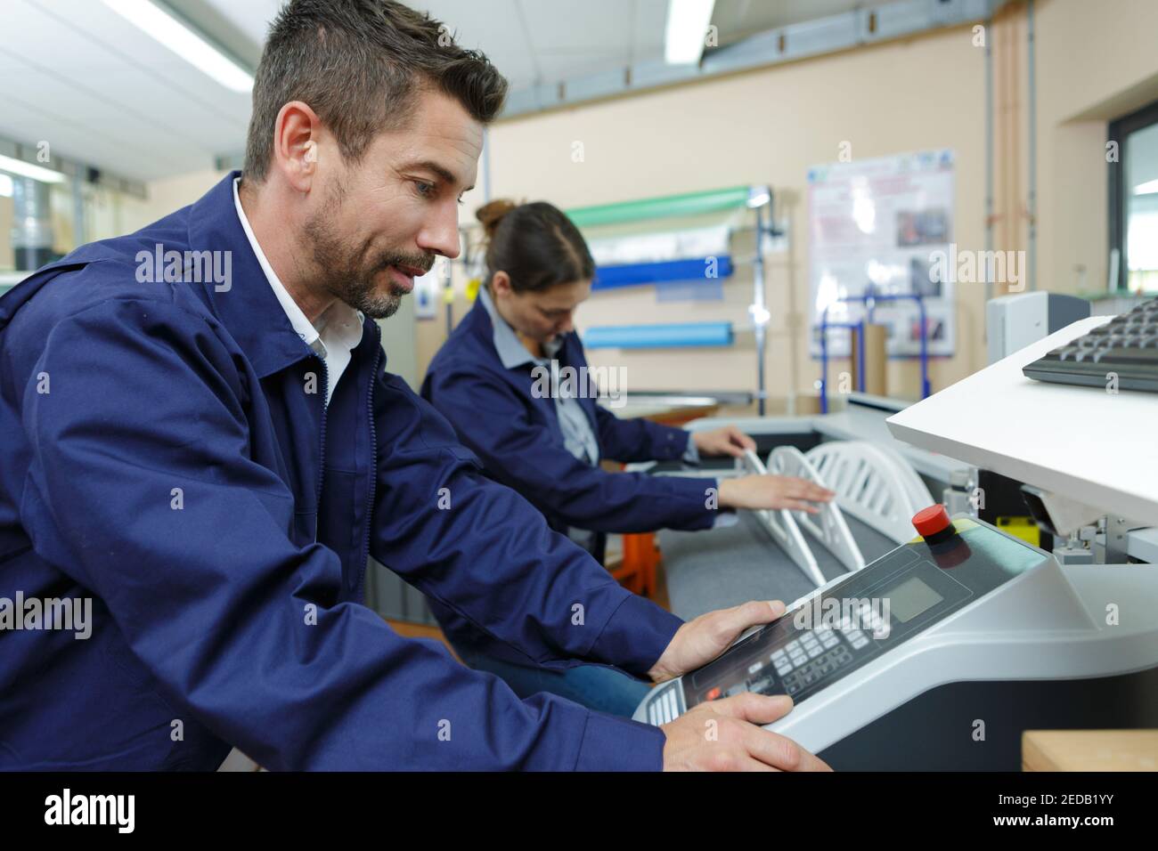 engineer using a machine machine Stock Photo - Alamy