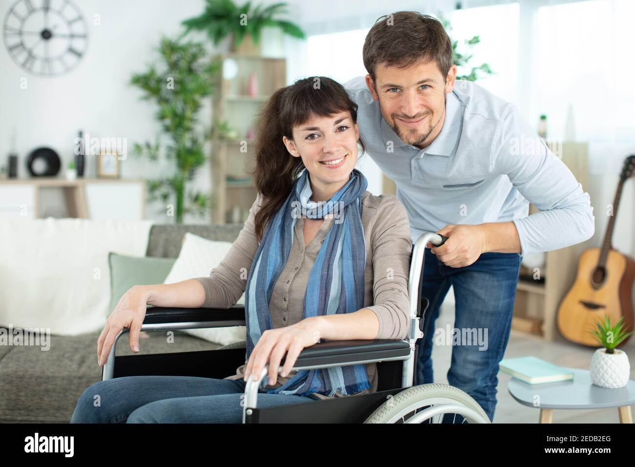 young woman with disability sitting on wheelchair Stock Photo - Alamy