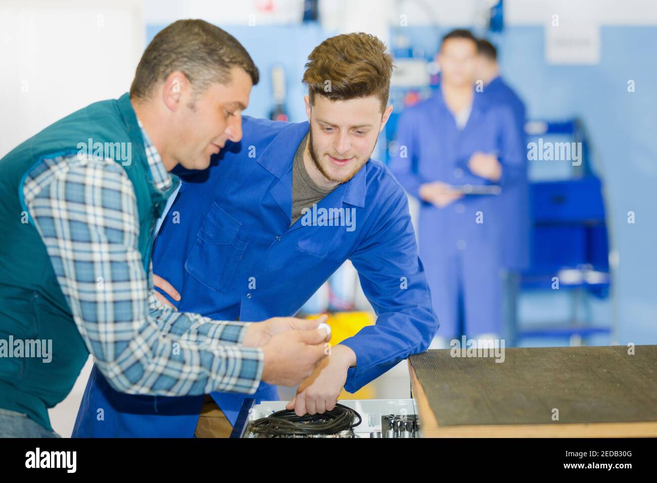 Guidance for apprentices hi-res stock photography and images - Alamy