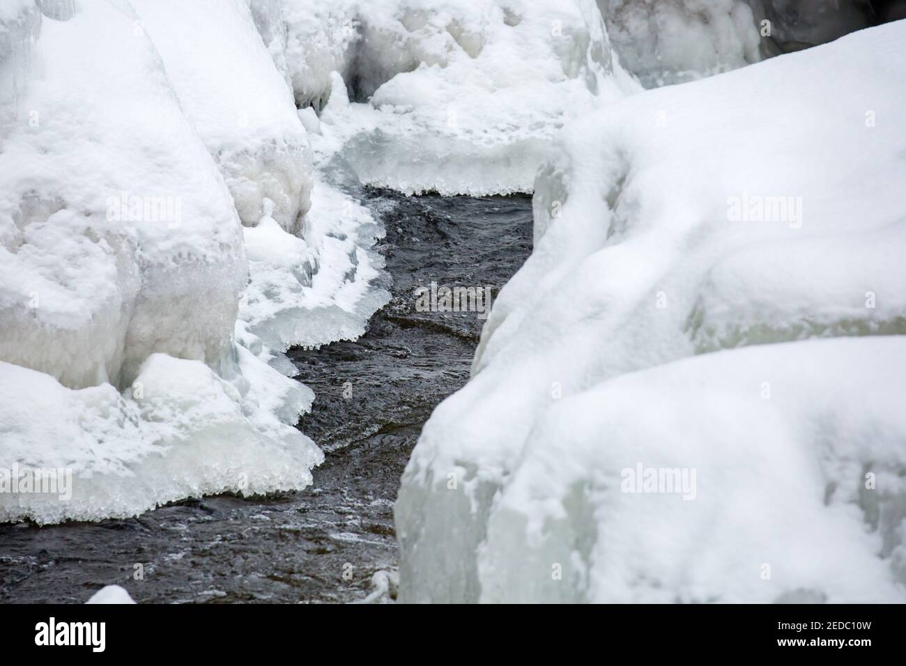 Ice formations formed on a Wisconsin cold river in January, horizontal ...