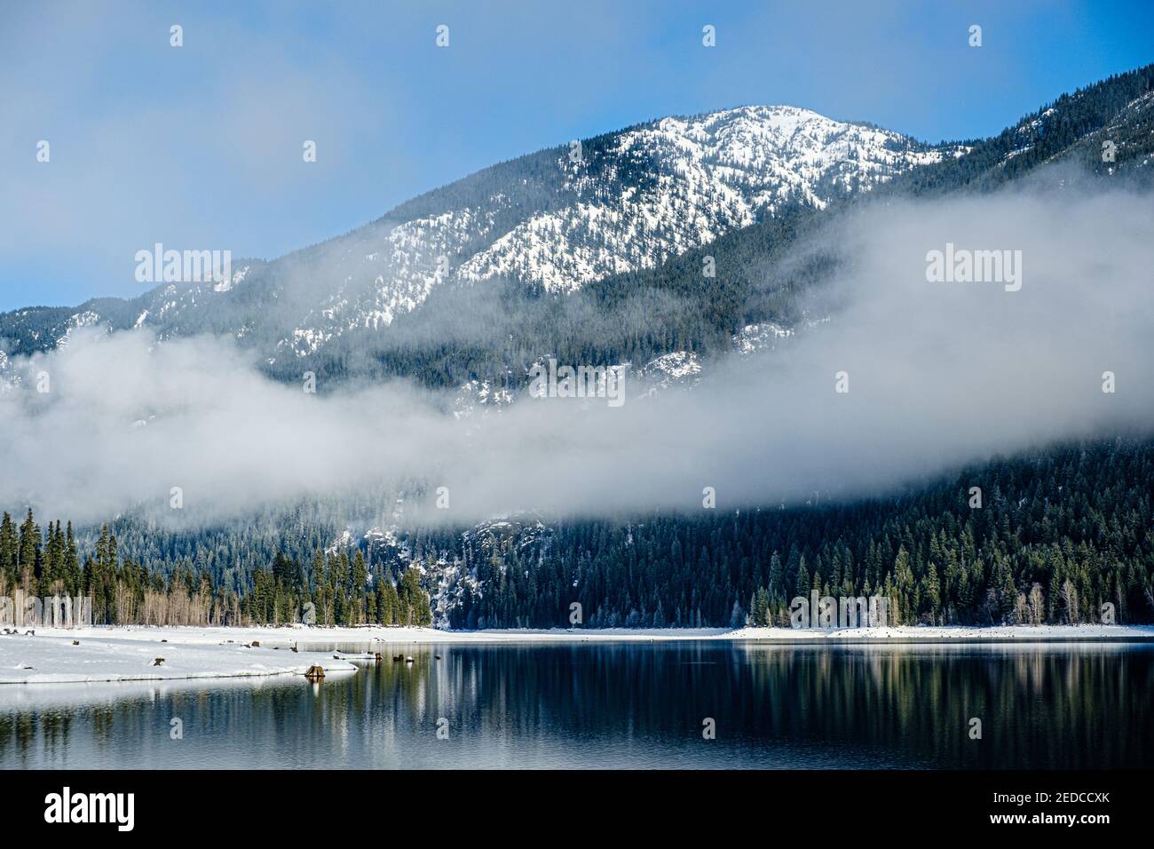 Cle Elum, WA, USA - January 23 2021: Mountain reflected on Lake Kachess ...