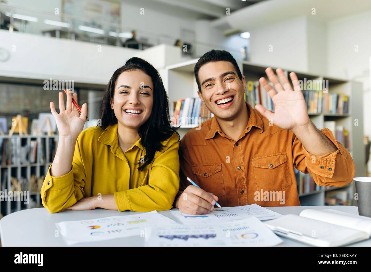Waving hands student hi-res stock photography and images - Alamy