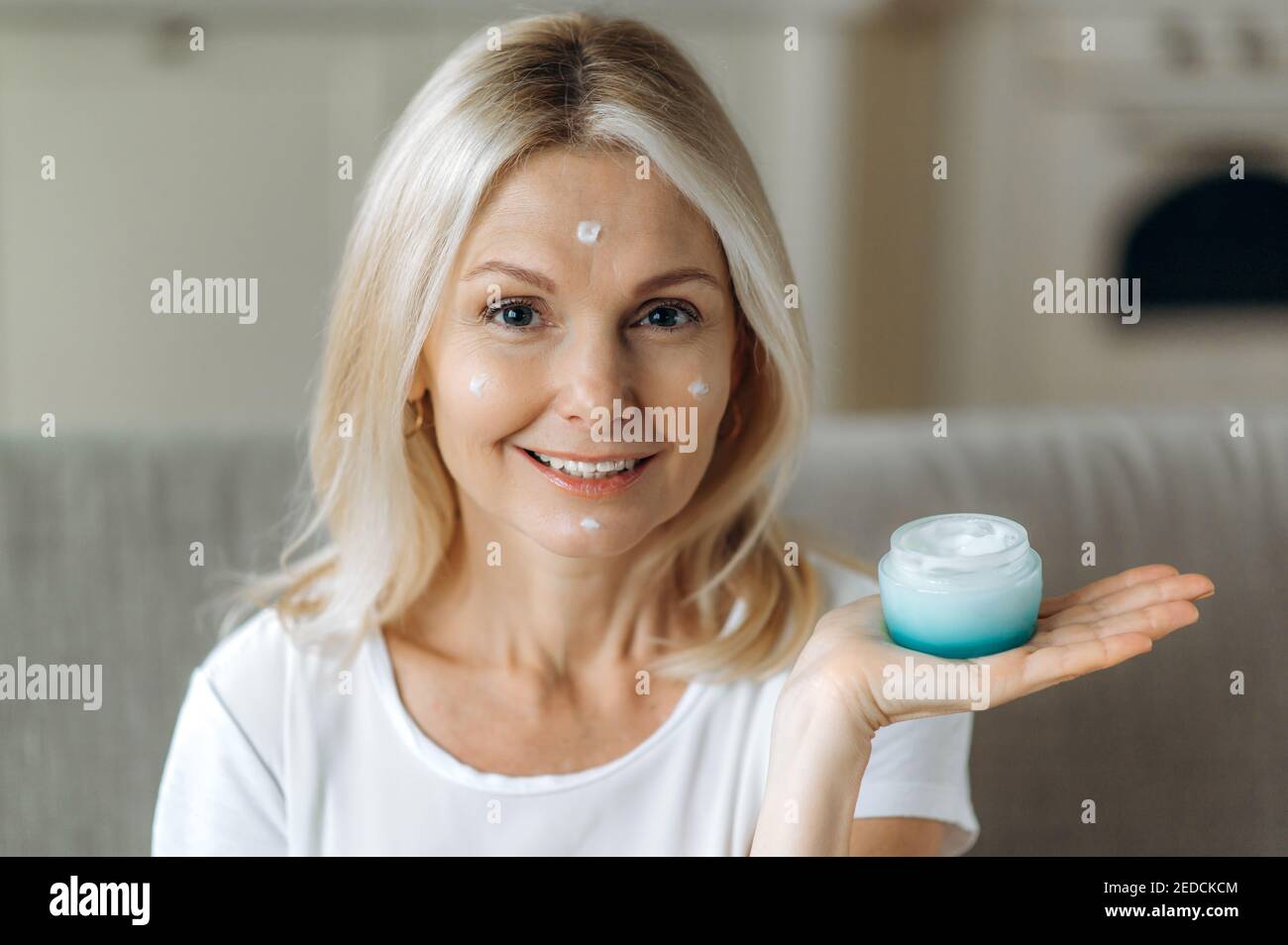 Woman applies anti aging wrinkle hi-res stock photography and images ...