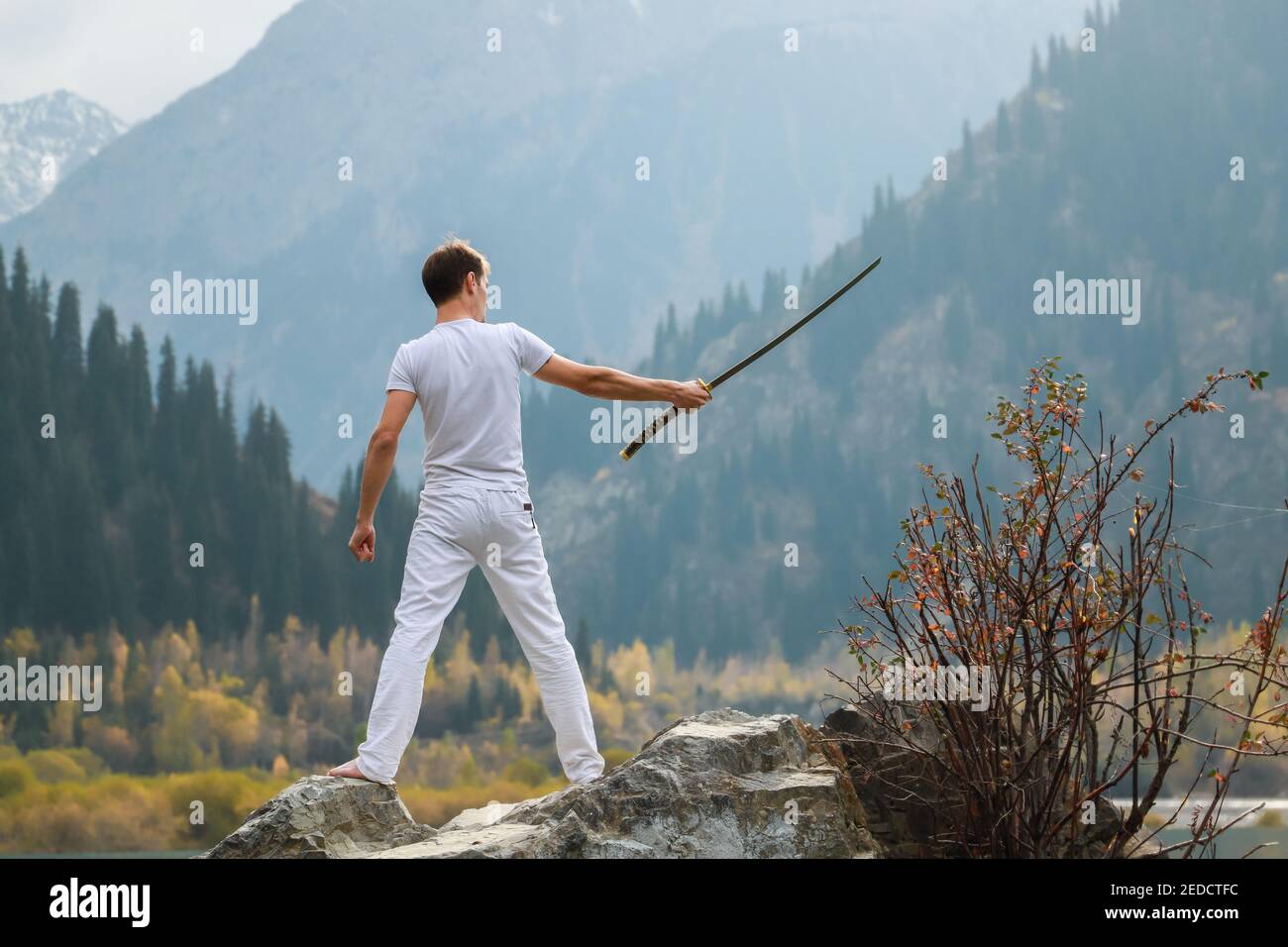 A man with a sword goes on the attack on the enemy. The emotional ...