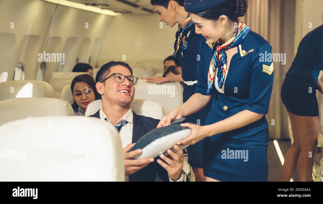Sleeping in airplane night flight hi-res stock photography and images ...