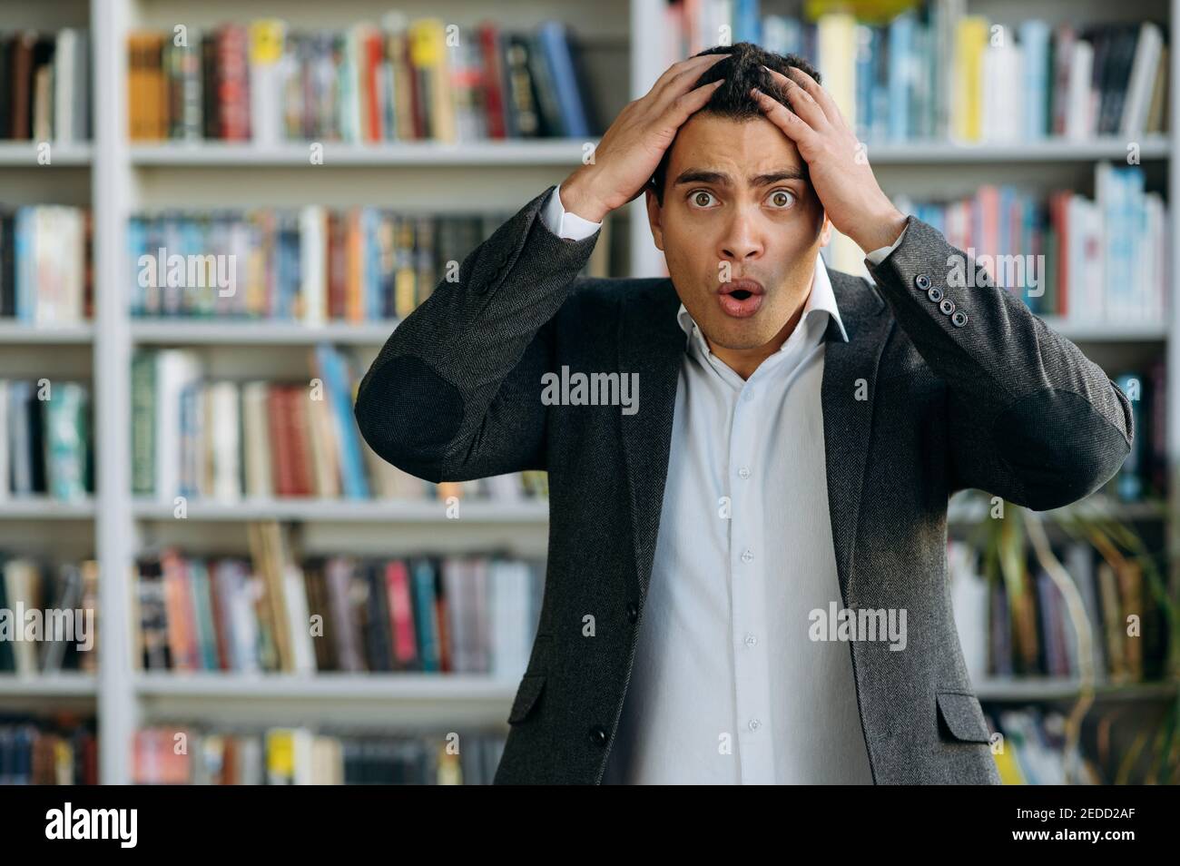 Portrait of confused businessman or student in formal wear. Surprised ...