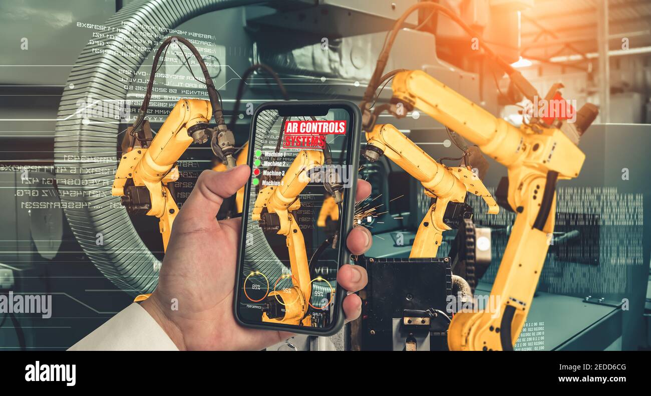 Engineer controls robotic arms by augmented reality industry technology application software ...