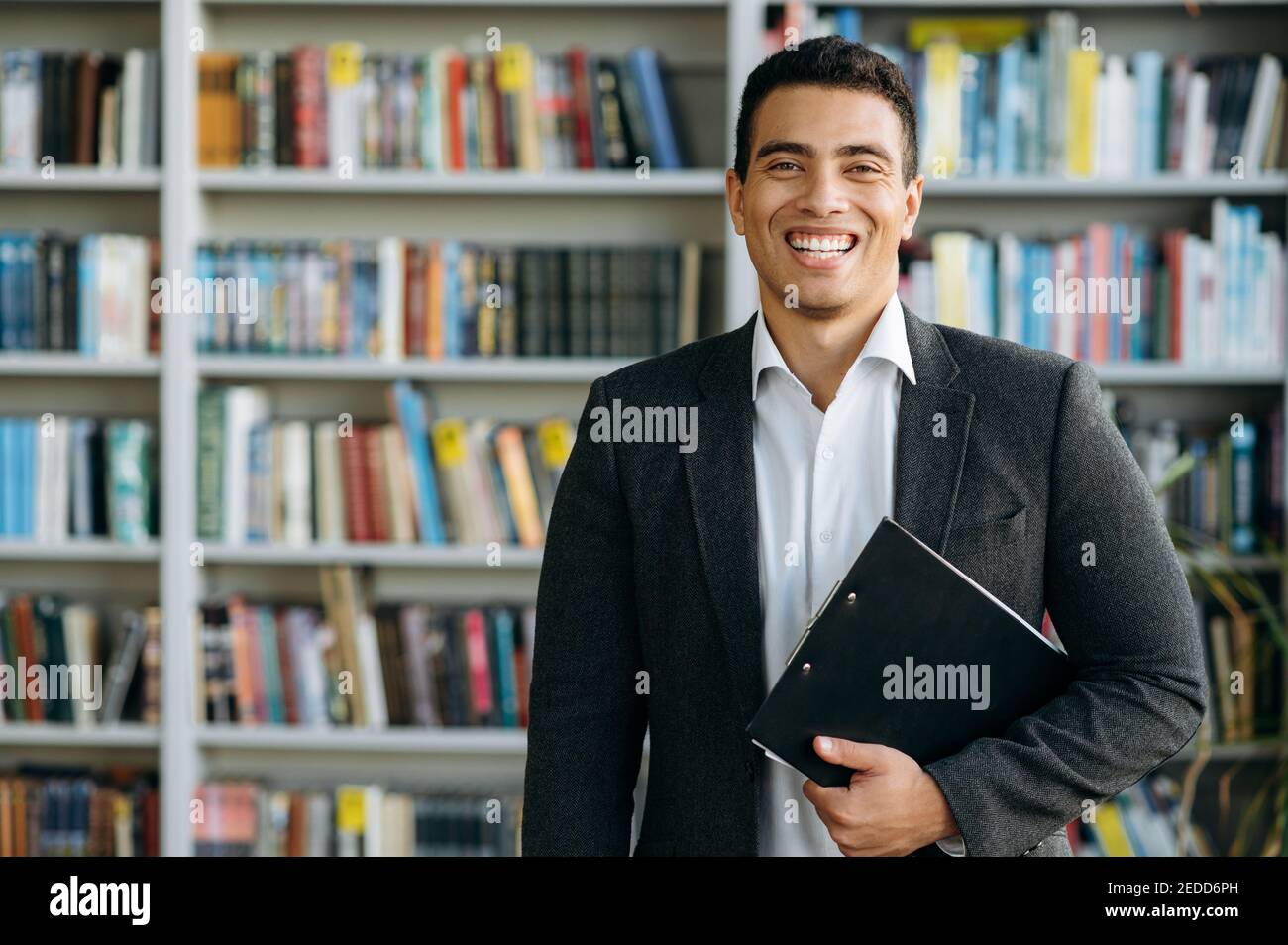 Portrait of influential hispanic male business leader. Attractive ...