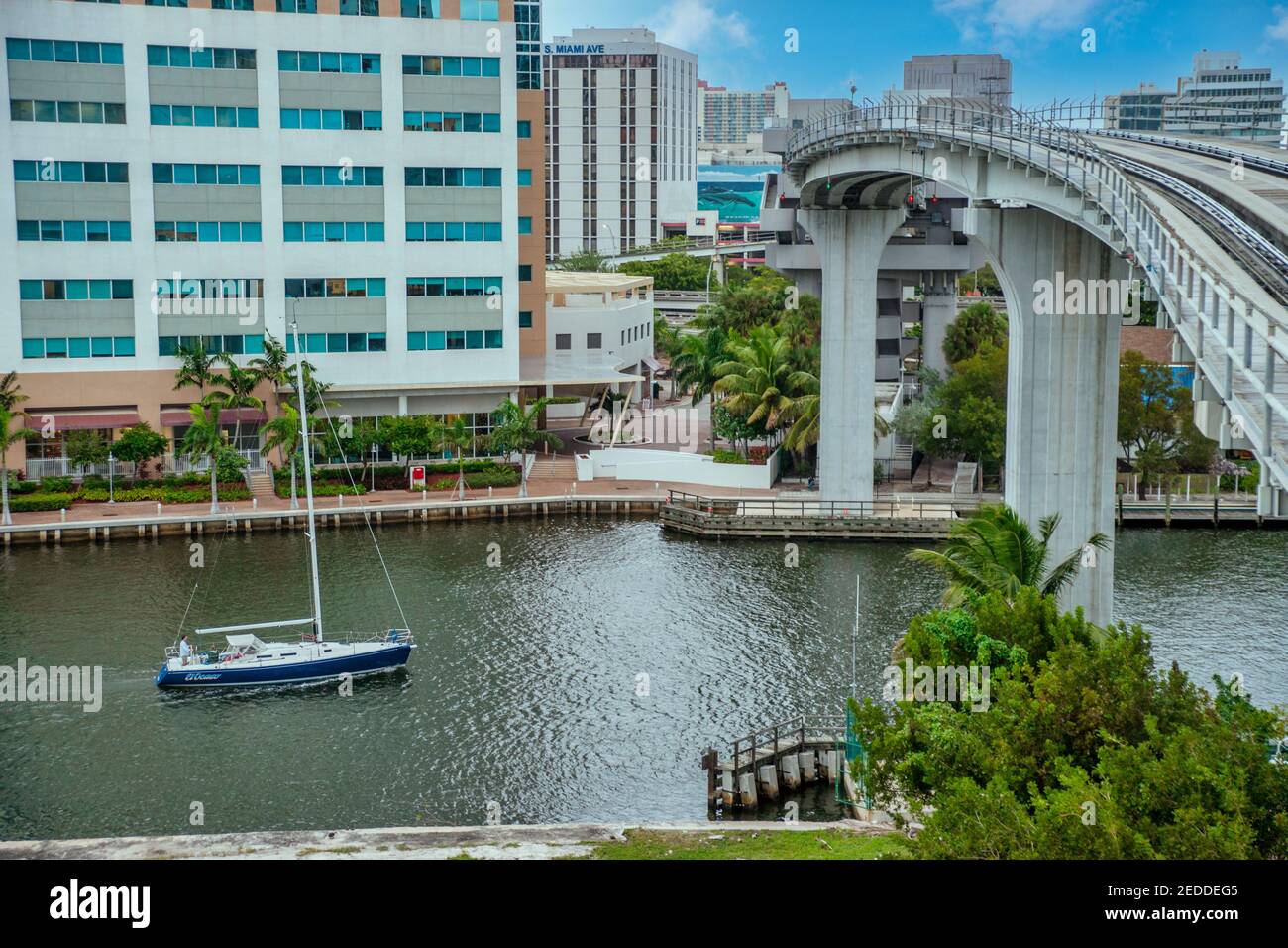 A sailboat about to cross under the Metromover Bridge on the Miami ...