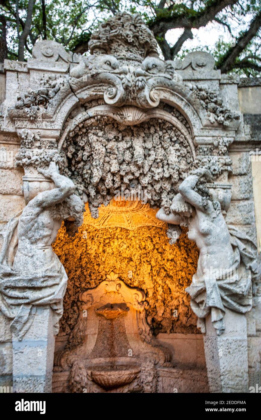 A pair of Roman stone statues hold up the grotto of the Garden Mound at ...