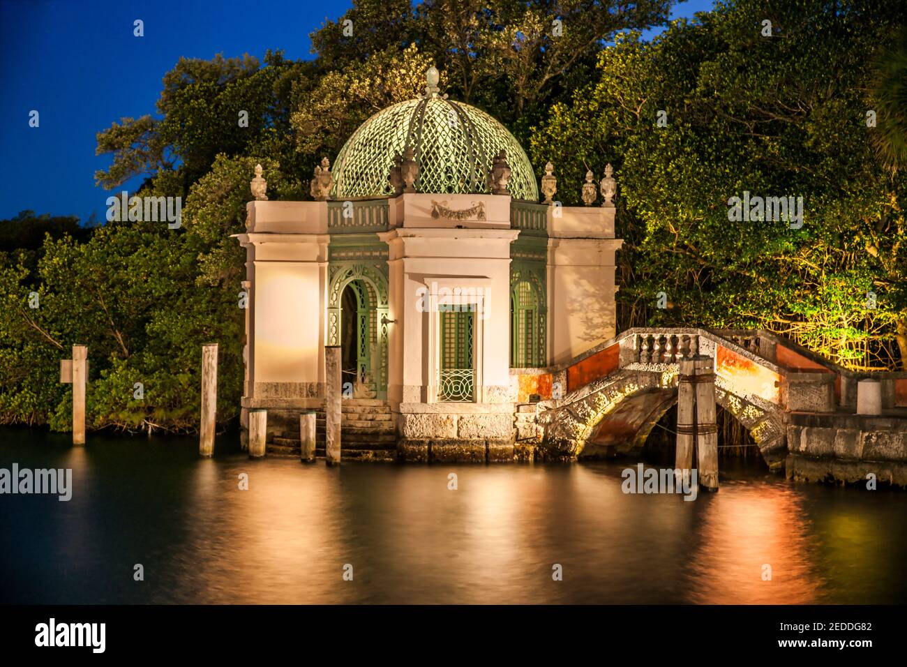 The Tea House at night on the edge of Biscayne Bay at Villa Vizcaya in ...
