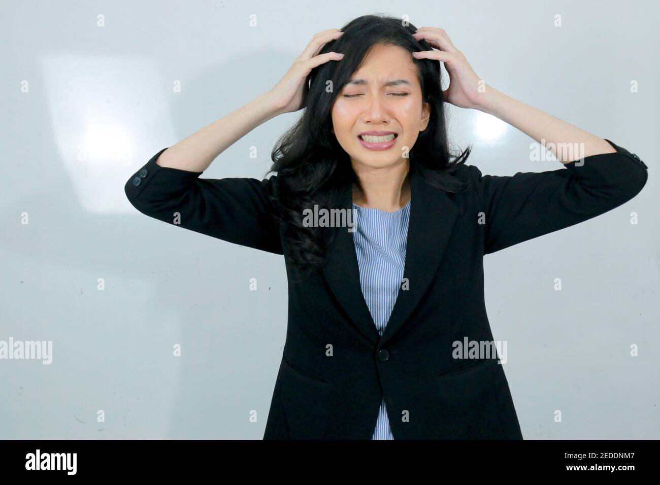 Business young asian girl is stress and confuse about her work isolated ...